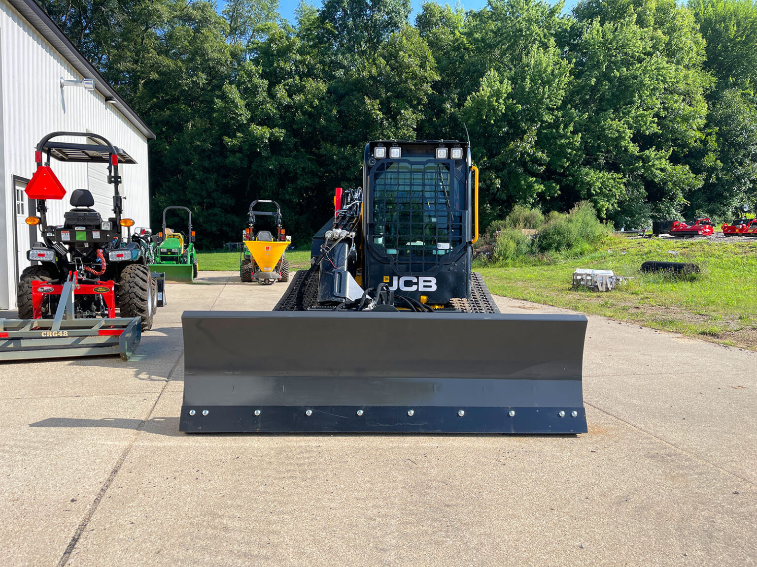 4-Way & 6-Way Articulating Dozer Blade for Skid Steers | IronCraft